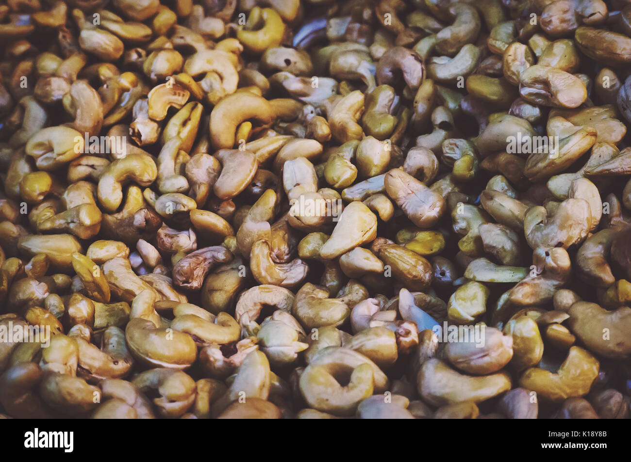 Cashews nut background. roasted cashews, tinted photo. The counter of ...
