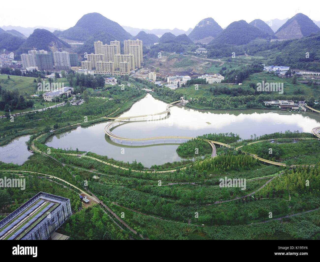 (170825) -- LIUPANSHUI, Aug. 25, 2017 (Xinhua) -- The Minghu wetland ...