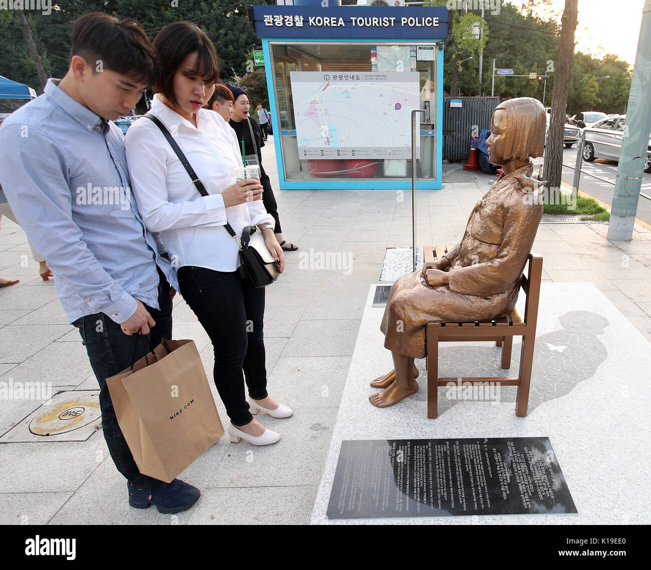 One more comfort women statue in Seoul Passersby look at a statue ...