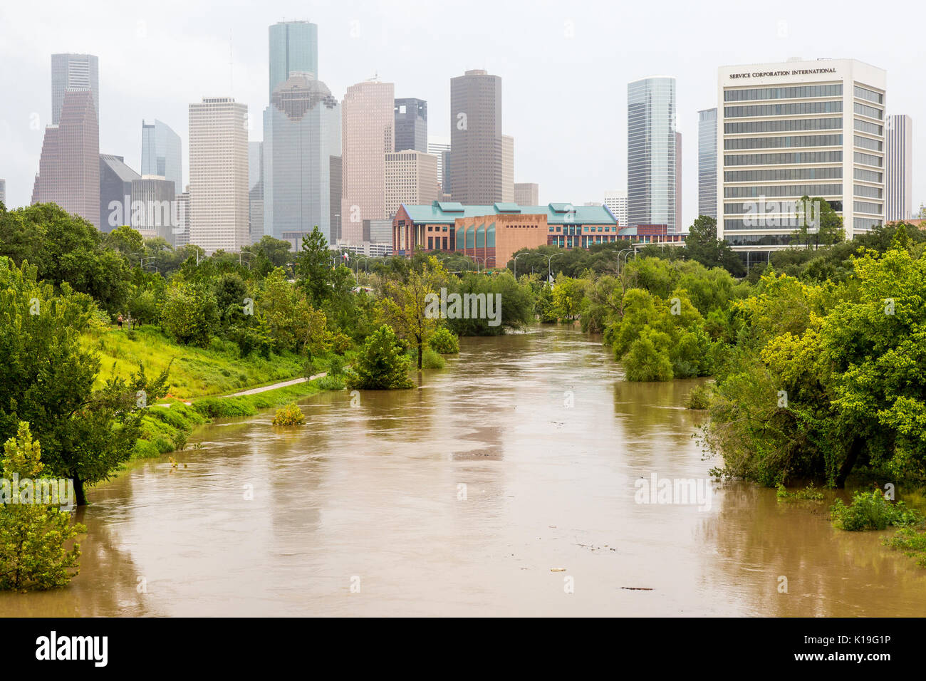 Houston, USA. 26th Aug, 2017. Floodwater flows in a river in Houston ...