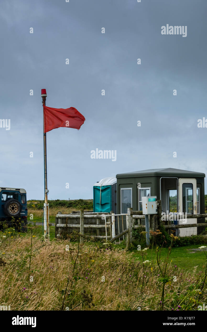 Red flag flying at Castlemartin Army Range, Pembrokeshire, Wales Stock ...