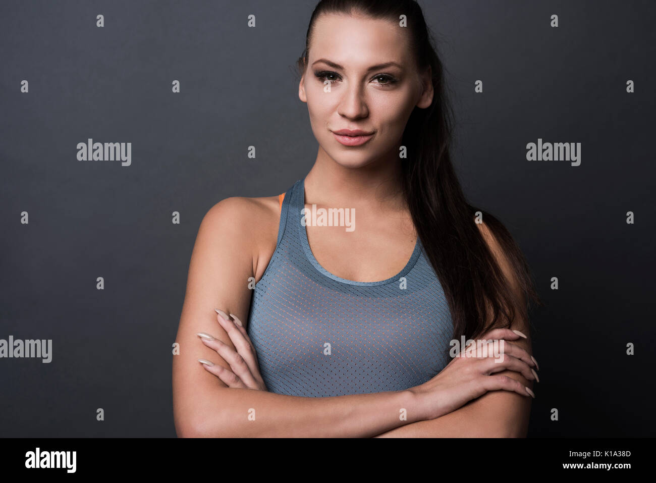 Attractive woman as a personal trainer Stock Photo - Alamy