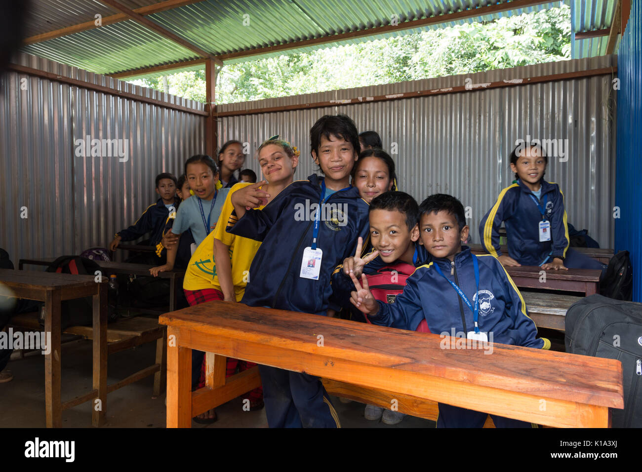 School children in the rural town of Dhulikhel enjoying a lesson from ...