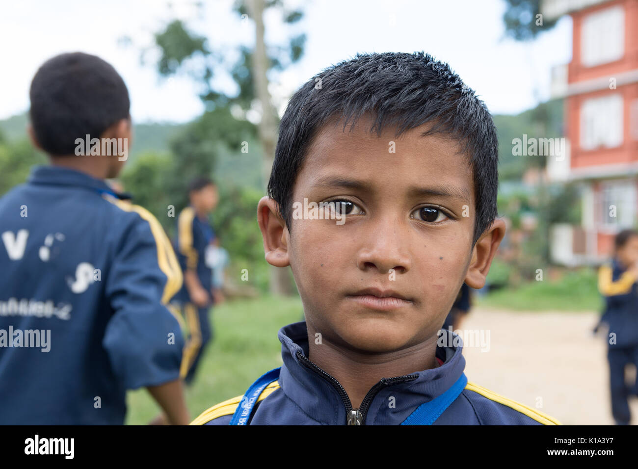 School children in the rural town of Dhulikhel enjoying a lesson from ...