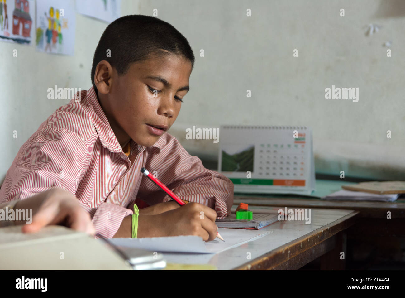 School children in the rural town of Dhulikhel enjoying a lesson from ...