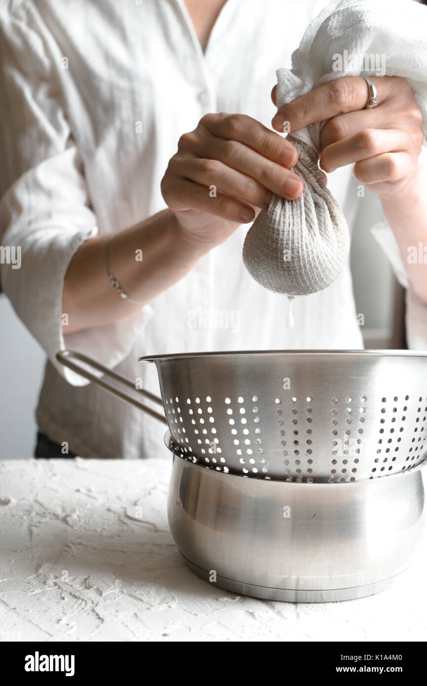 Strain the dense mass from hemp seeds through a napkin for milk ...