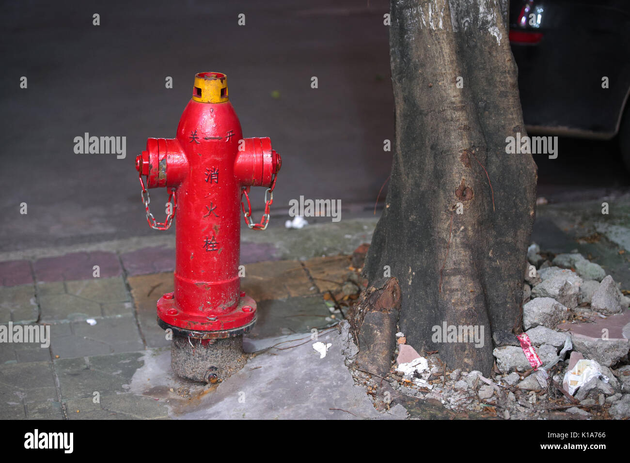 Red chinese fire hydrant hi-res stock photography and images - Alamy