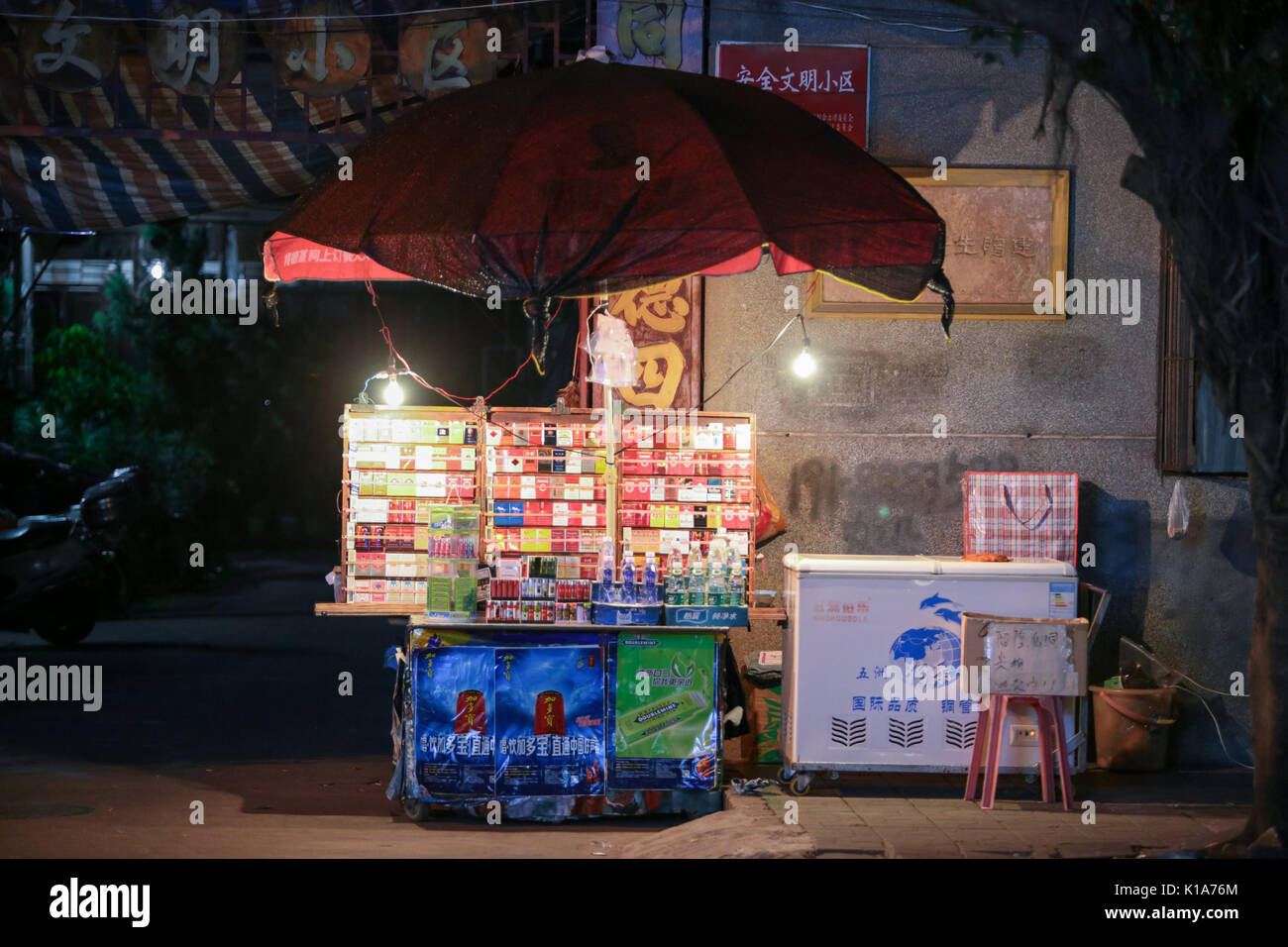 A cigarette stall at a night market in Chaozhou town, Guangdong, China ...