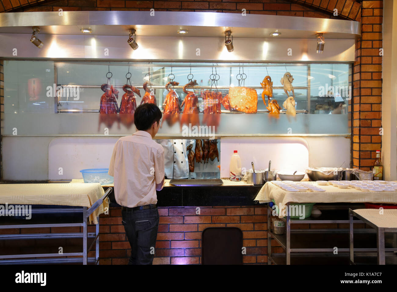 Meat preparation section of a chinese restaurant at Guangzhou ...