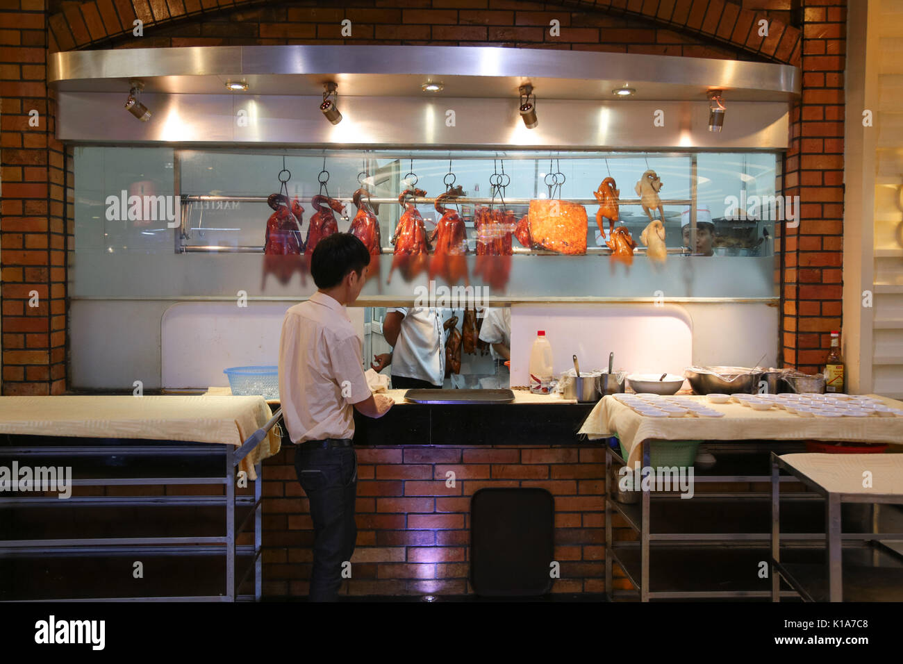Meat preparation section of a chinese restaurant at Guangzhou ...