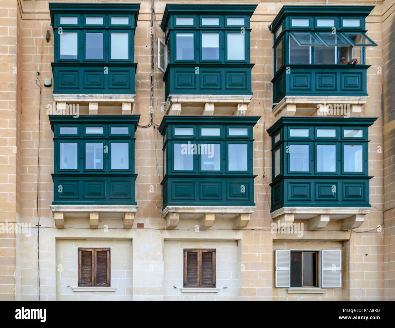 Building with traditional glass balcony hi-res stock photography and ...
