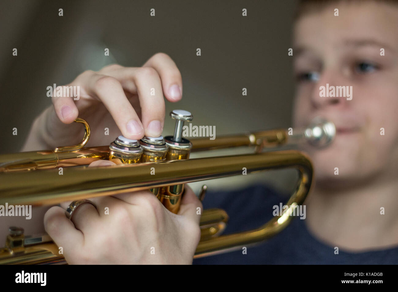 Young Boy Practicing his Trumpet Stock Photo - Alamy
