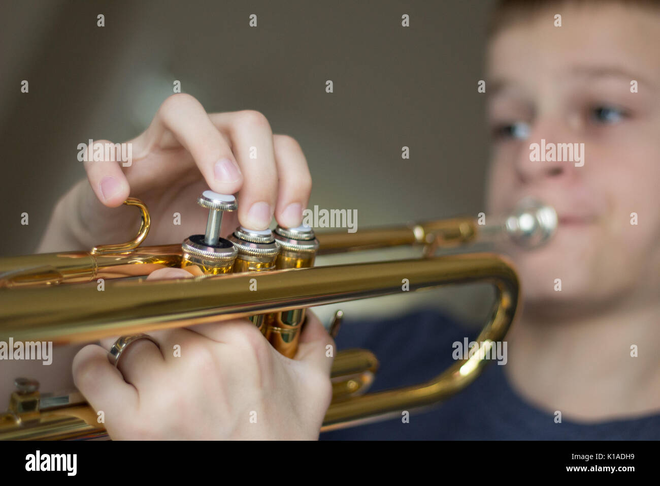 Young Boy Practicing his Trumpet Stock Photo - Alamy