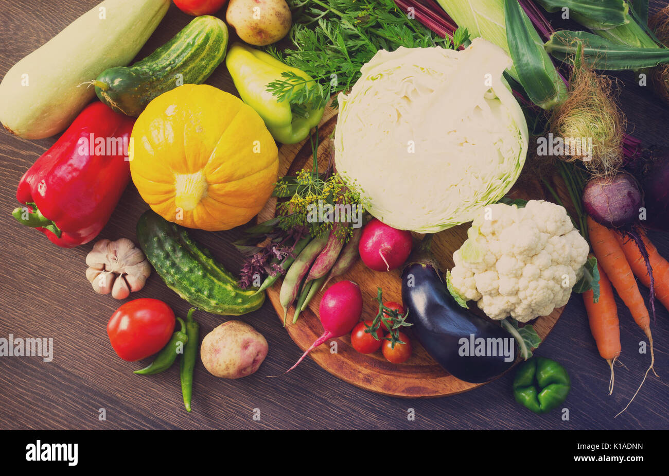 Fresh mixed different vegetables on a wooden oak background. Food ...