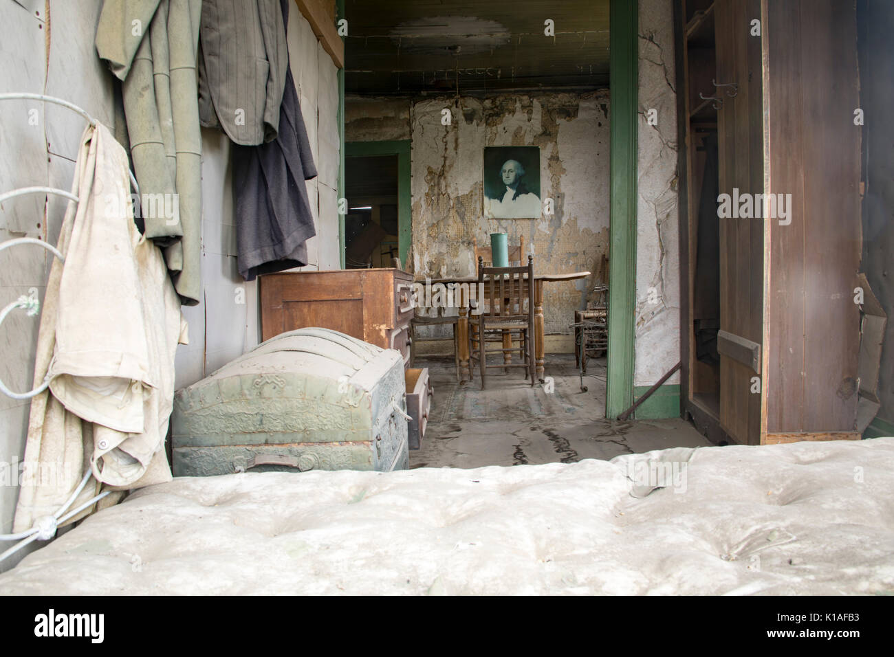 Interior of home in Bodie State Historic Park with portrait of George ...