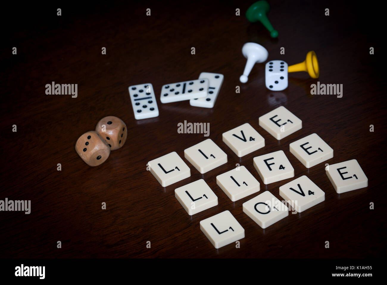 Spelling spell out with scrabble tiles hi-res stock photography and ...