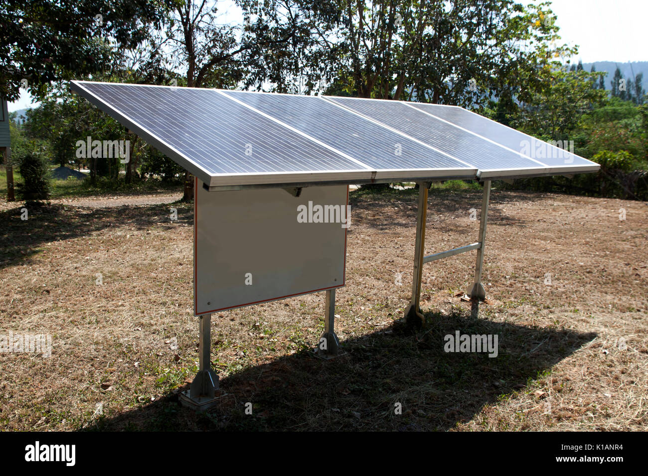 solar energy panels installed on the lawn for generating clean power ...