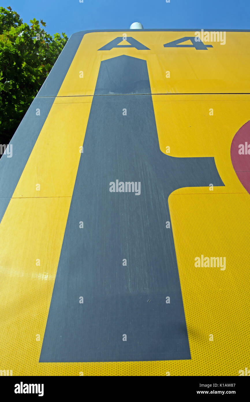 british yellow and black road sign showing A4 route Stock Photo - Alamy