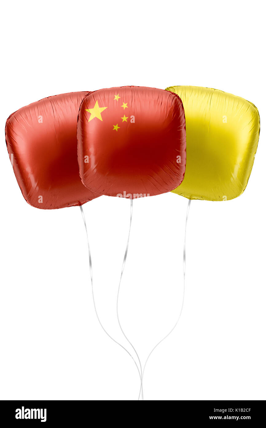 Three balloons represent China flag colors are floating on a white ...