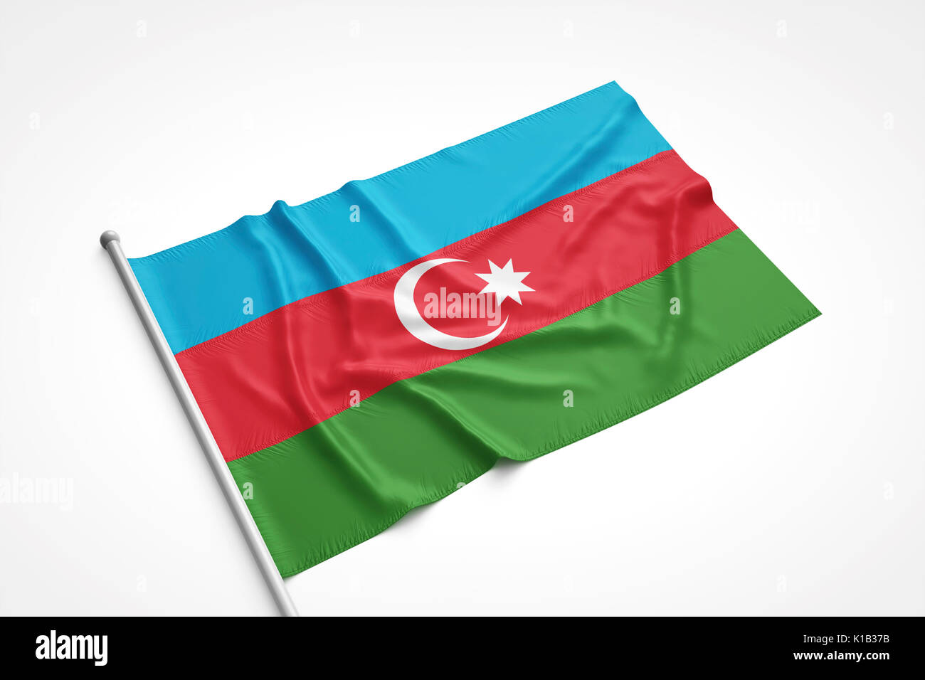 Azeri flag is laying on a white surface with flag pole attached. 3D ...