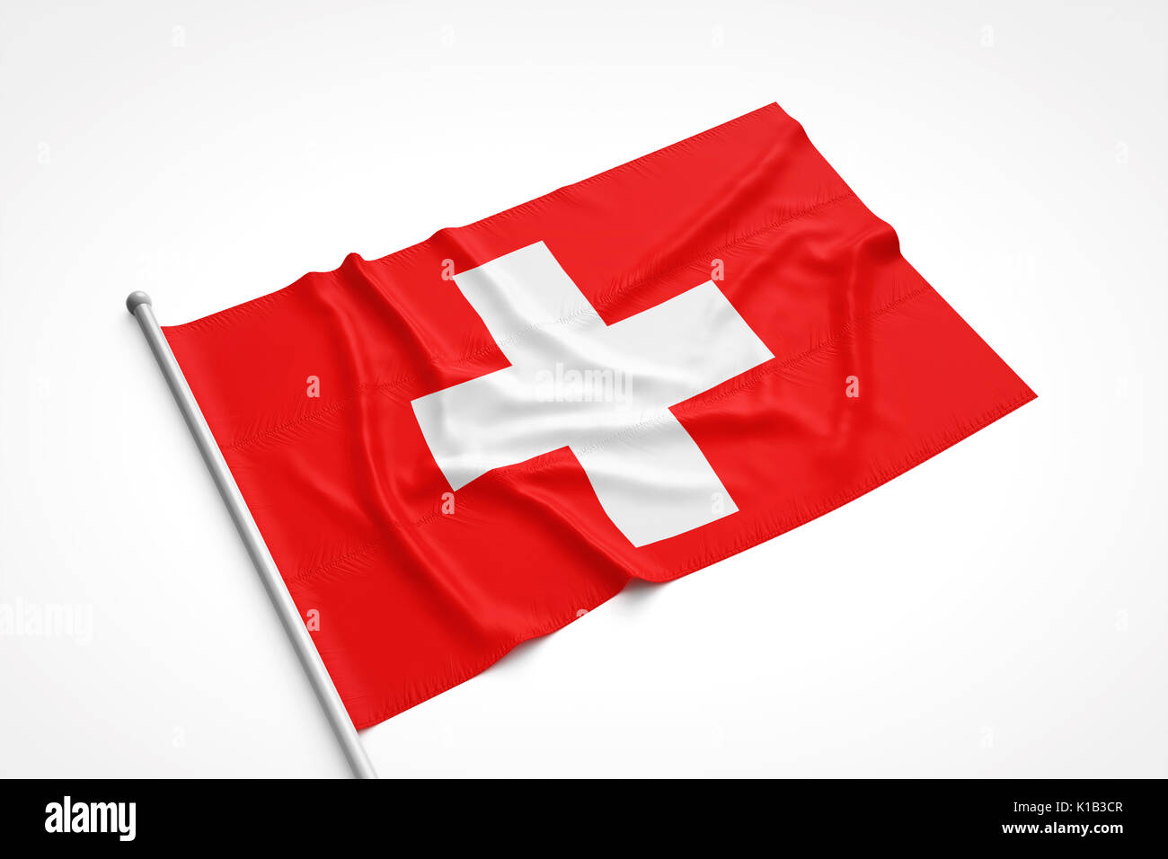 Swiss flag is laying on a white surface with flag pole attached. 3D ...