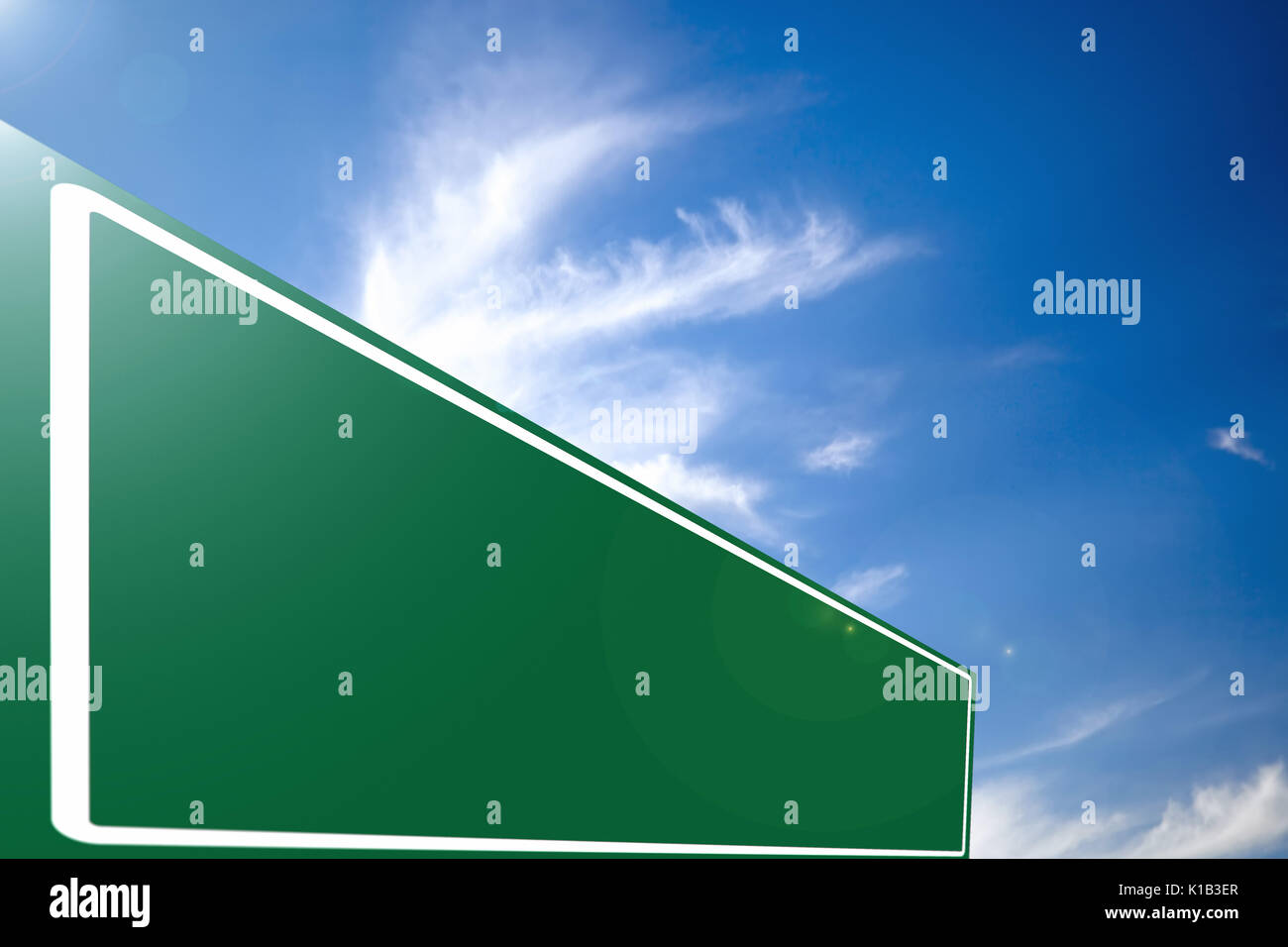 Empty hi-res 3D highway road sign against a blue sky with cloudscape ...