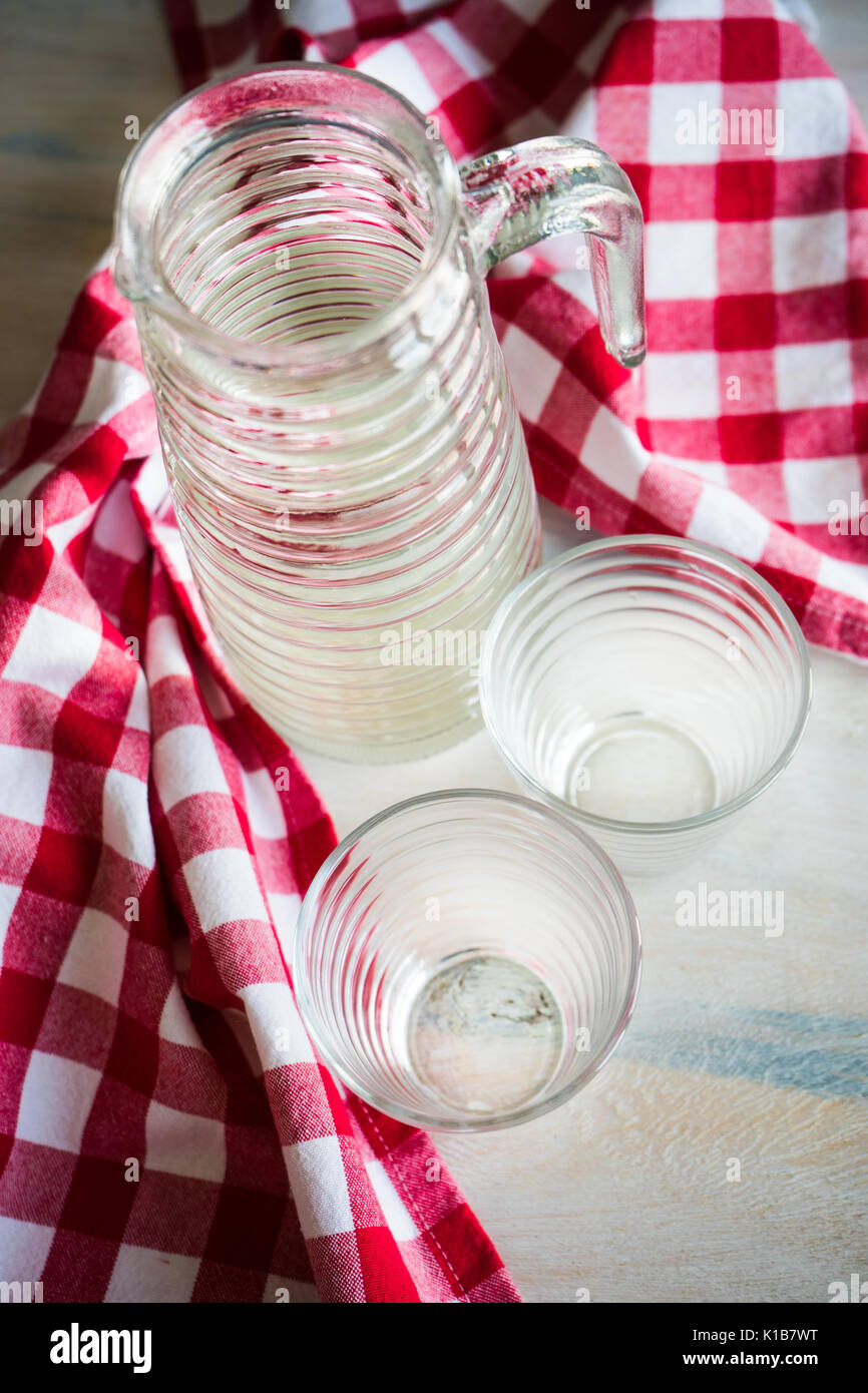 Glass of pure water as a healthy drinking concept on concrete table ...