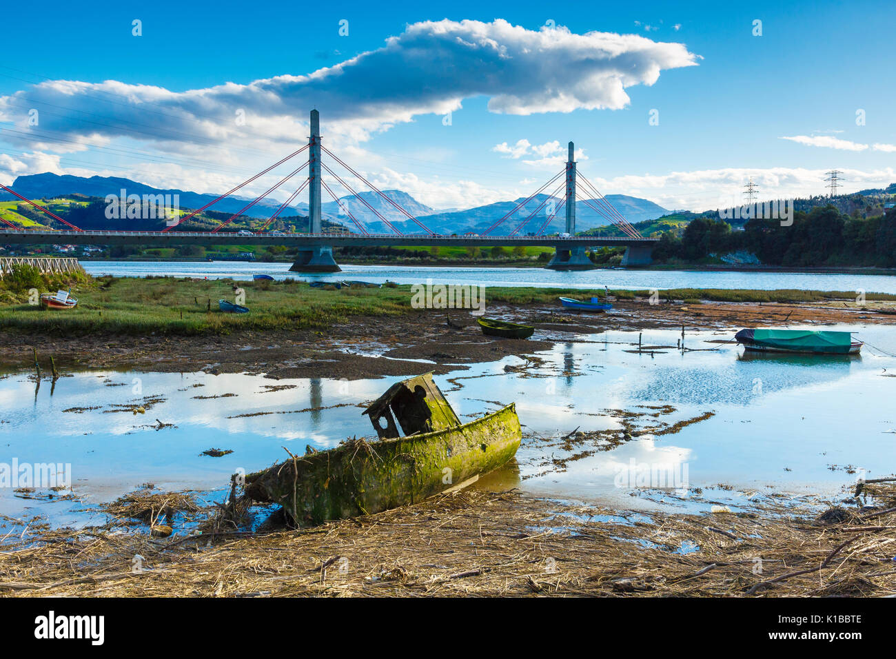 Old boat, bridge and tidal remains Stock Photo - Alamy
