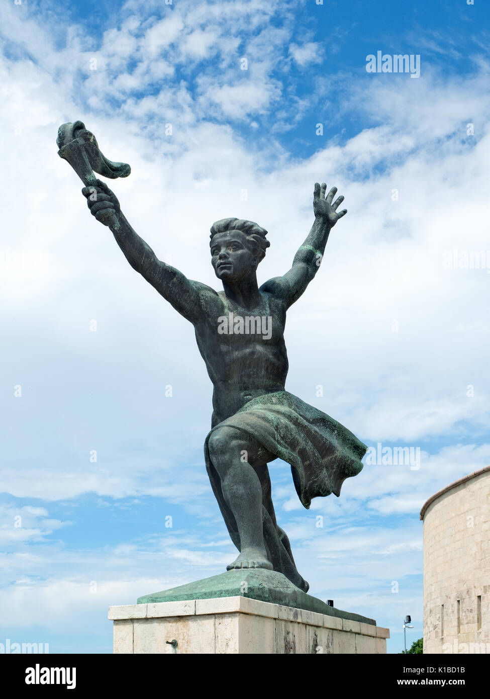 The Man with a torch statue next to Liberty monument on the Gellert ...