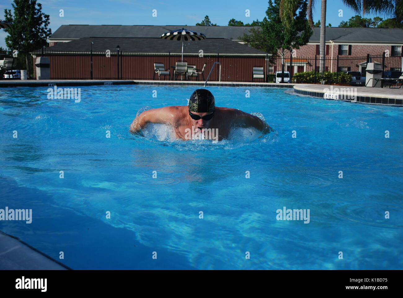 Swimmer workout in swimming pool close up Stock Photo - Alamy
