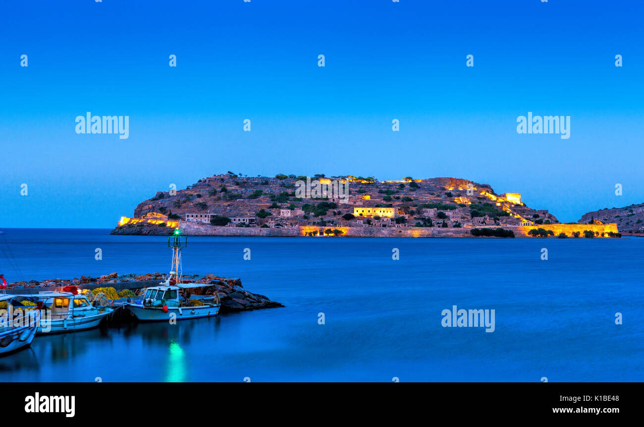 View of the island of Spinalonga at night, Crete, Greece Stock Photo ...