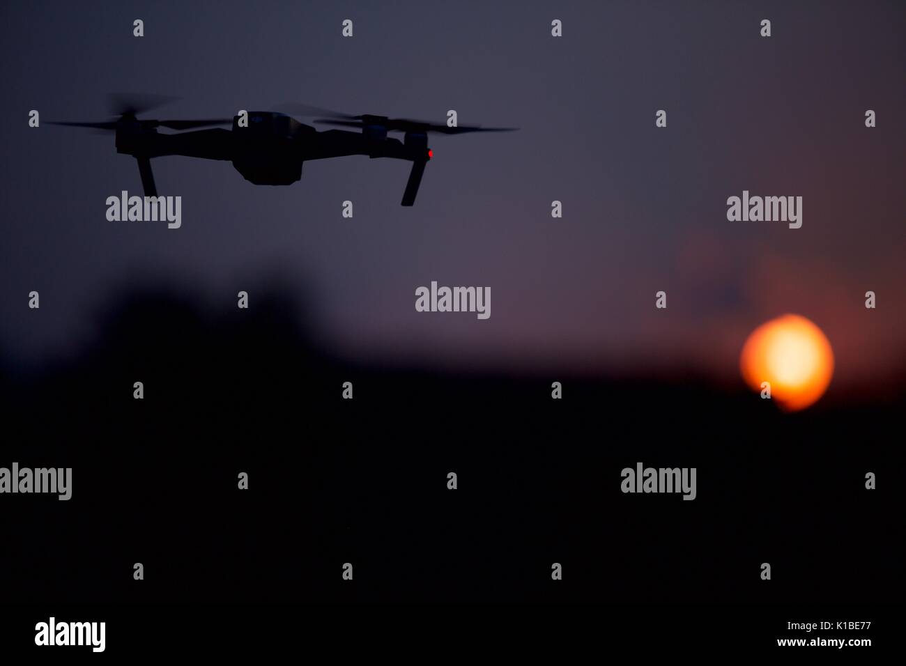 Drone at sunset Stock Photo - Alamy