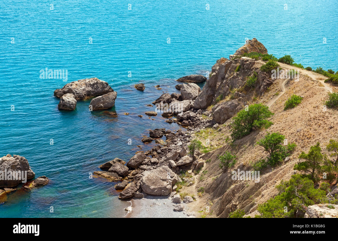 Seashore with big rock hi-res stock photography and images - Alamy