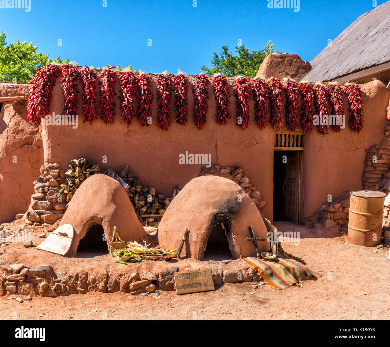 Kiva stoves outside of an adobe building at Rancho Las Golondrinas near ...