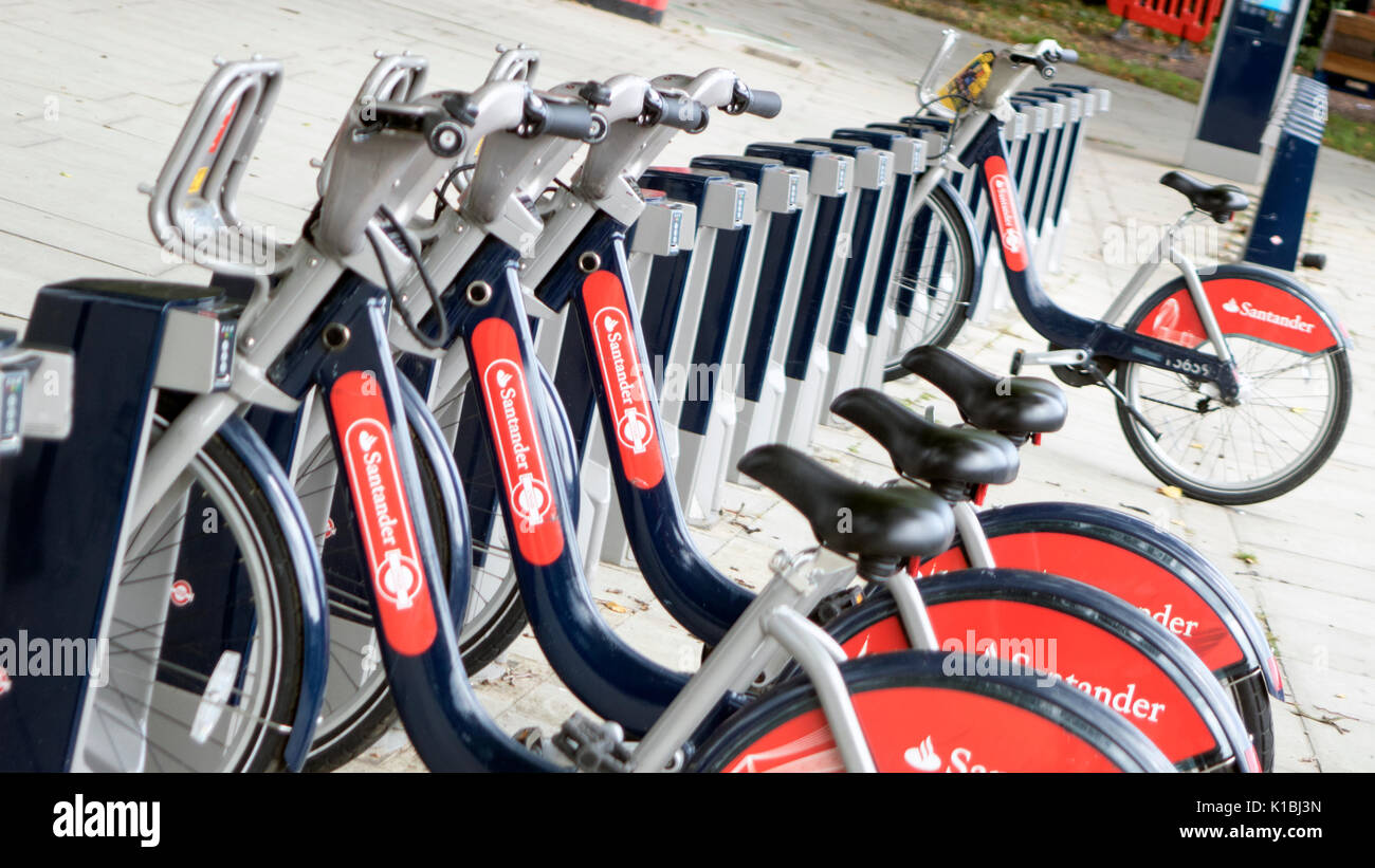 Santander Cycles parked at a docking station in London, England Stock ...