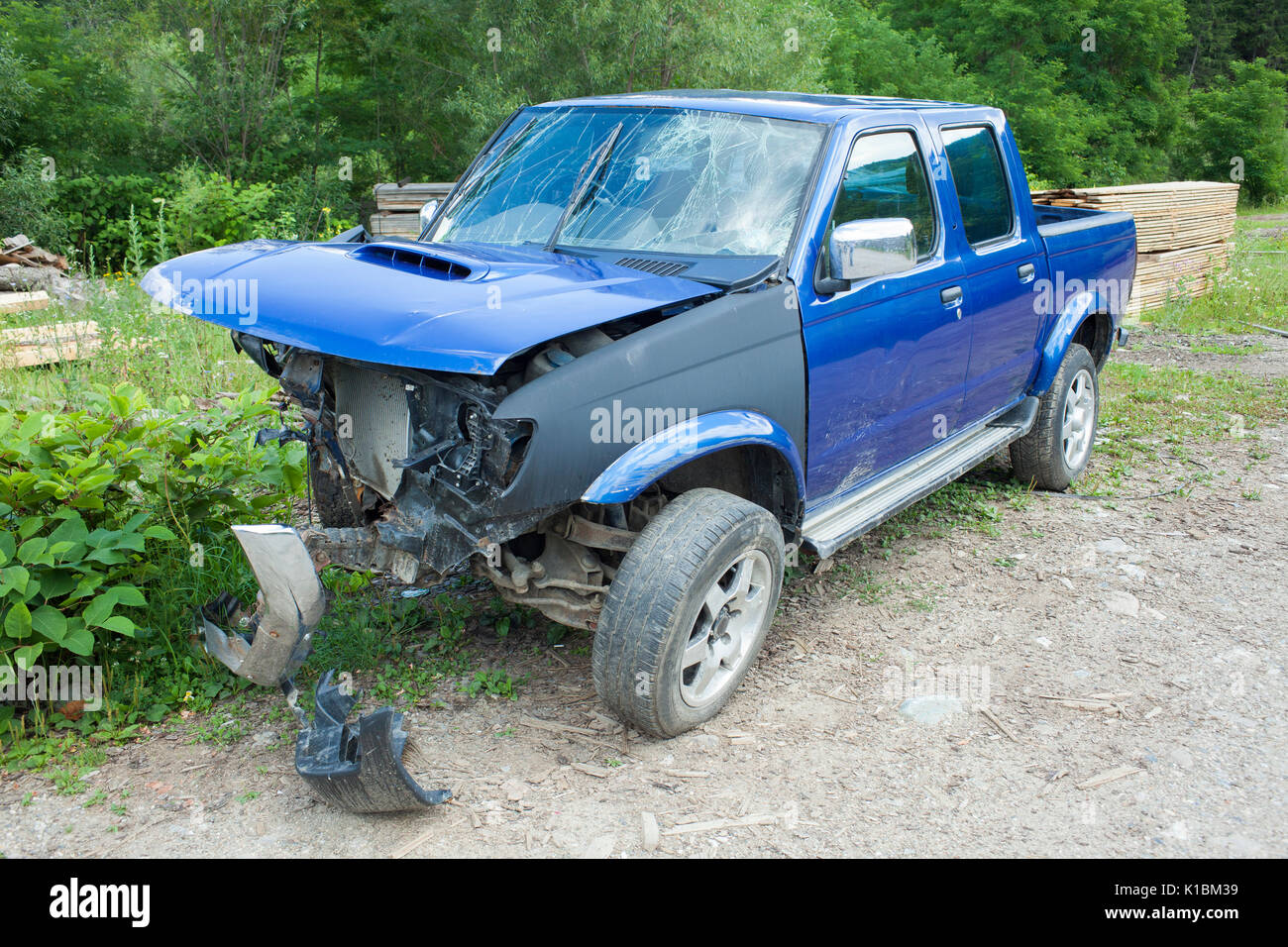 blue wrecked car after accident Stock Photo - Alamy