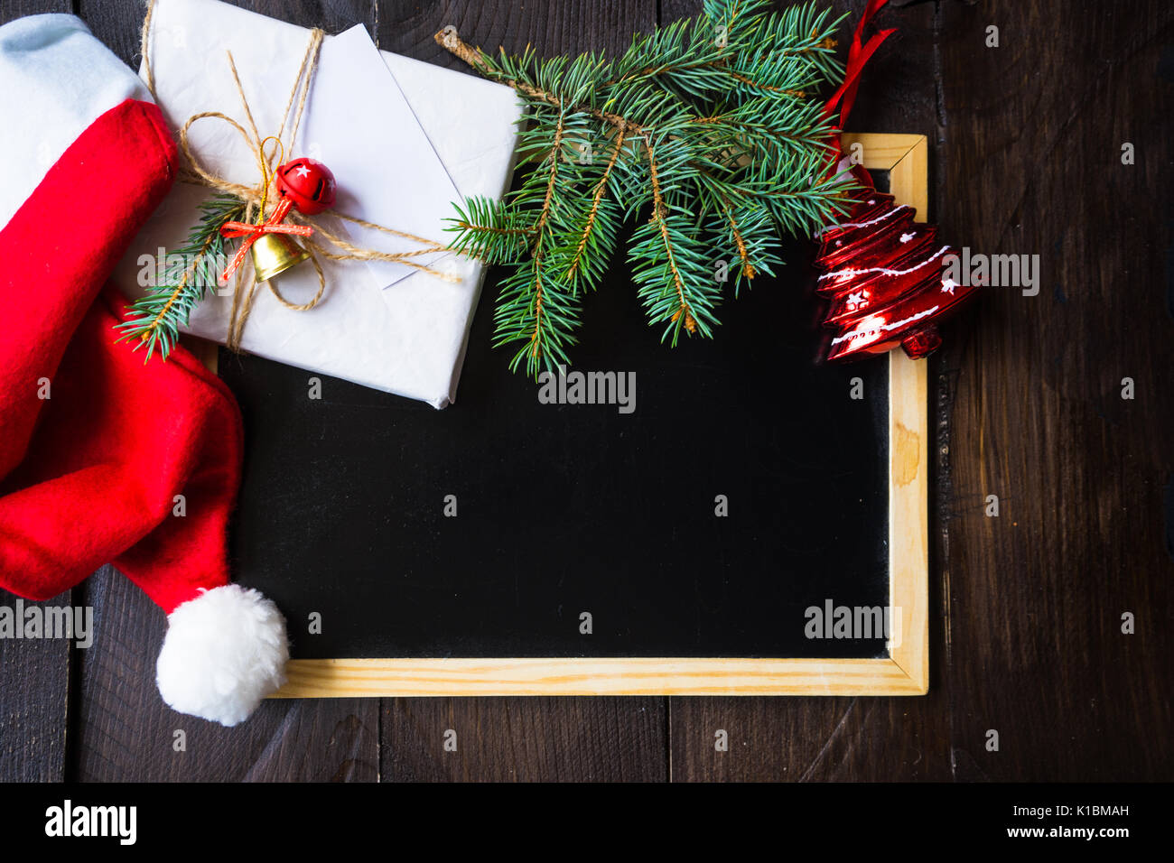 Festive Christmas themed frame with gift box and chalk board Stock ...