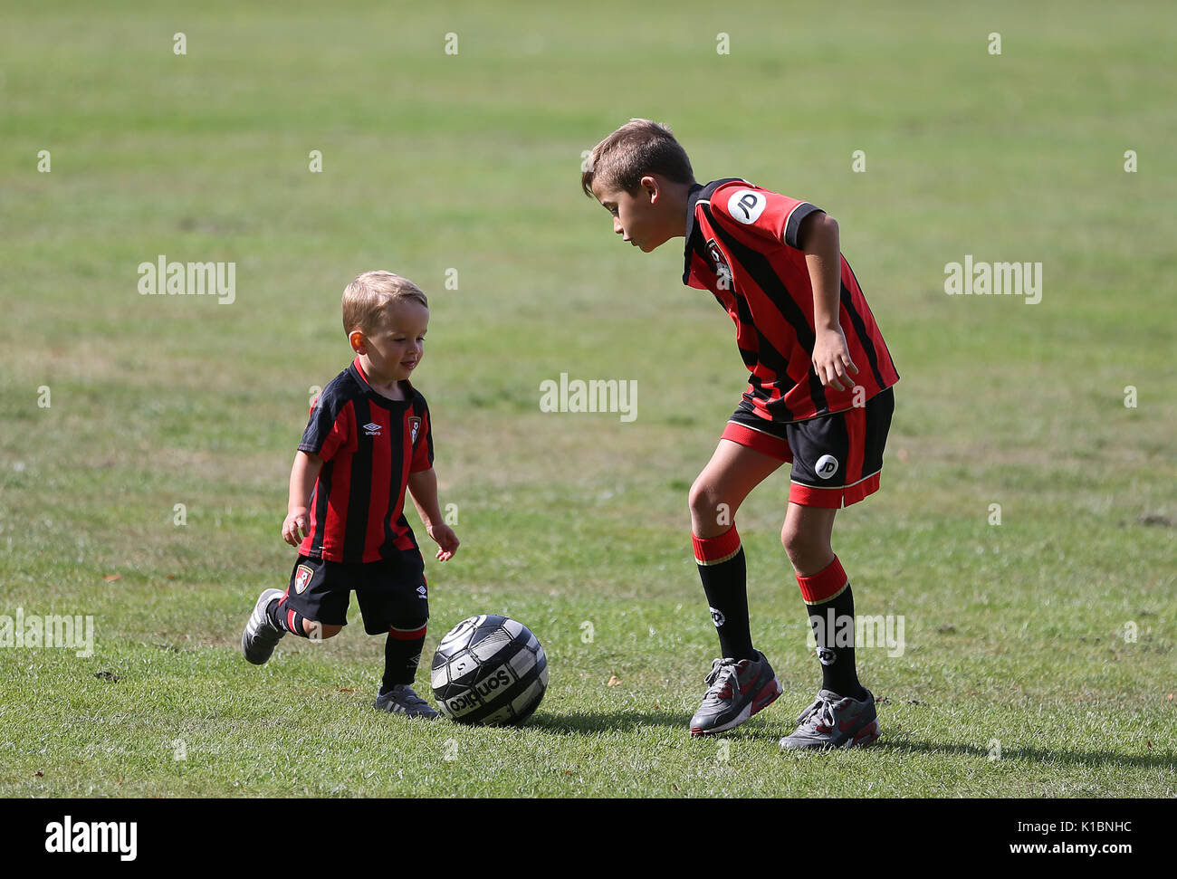 Young Bournemouth fans play football outside the ground before the ...