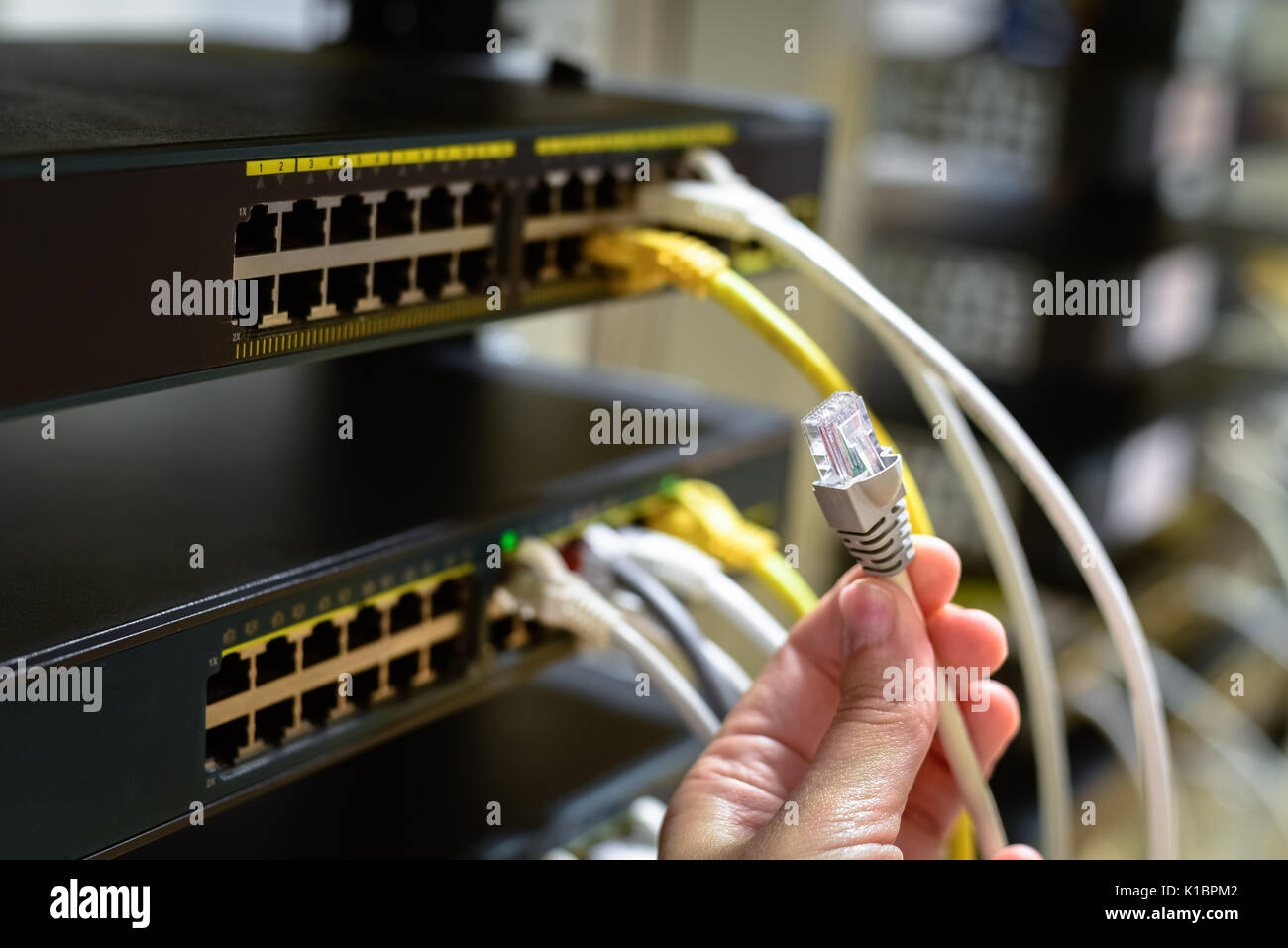 Ethernet cable hand hi-res stock photography and images - Alamy