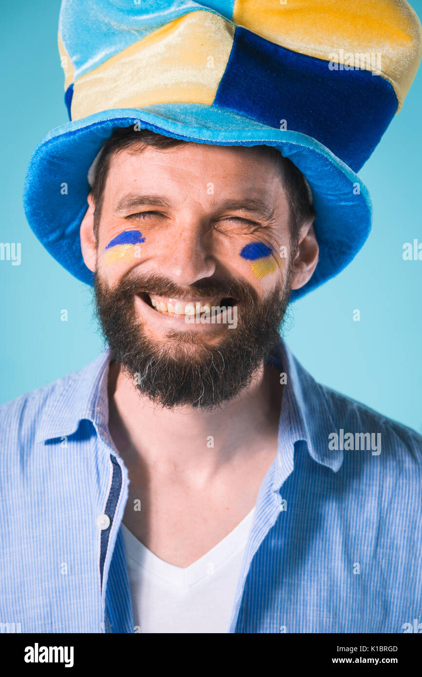 The football fan over blue Stock Photo - Alamy