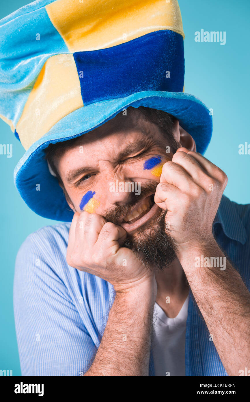 The football fan over blue Stock Photo - Alamy