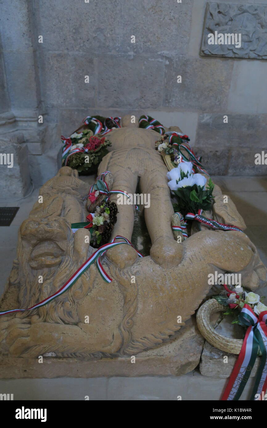 Interesting interior of mighty ecclesiastic church. Concrete dead body ...