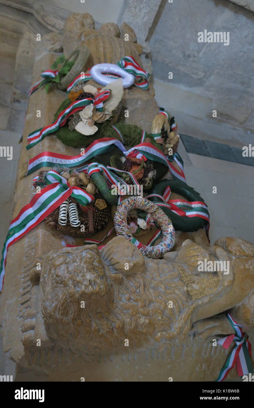 Interesting interior of mighty ecclesiastic church. Concrete dead body ...