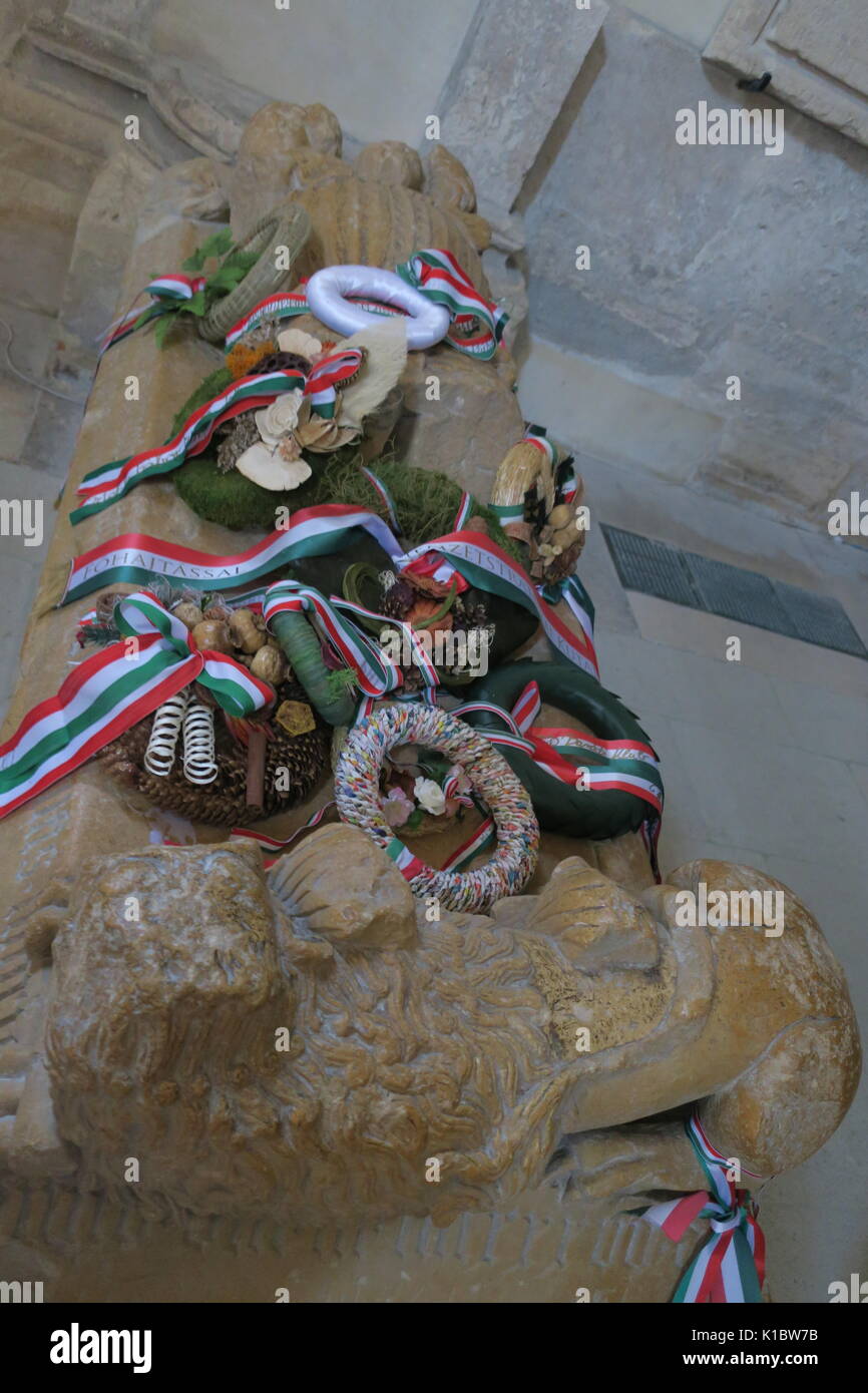 Interesting interior of mighty ecclesiastic church. Concrete dead body ...