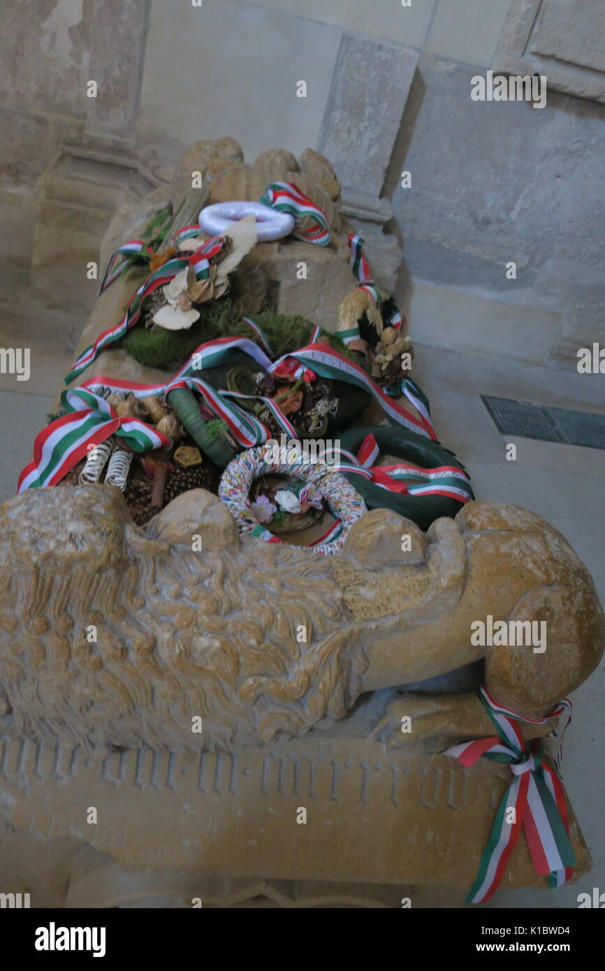 Interesting interior of mighty ecclesiastic church. Concrete dead body ...