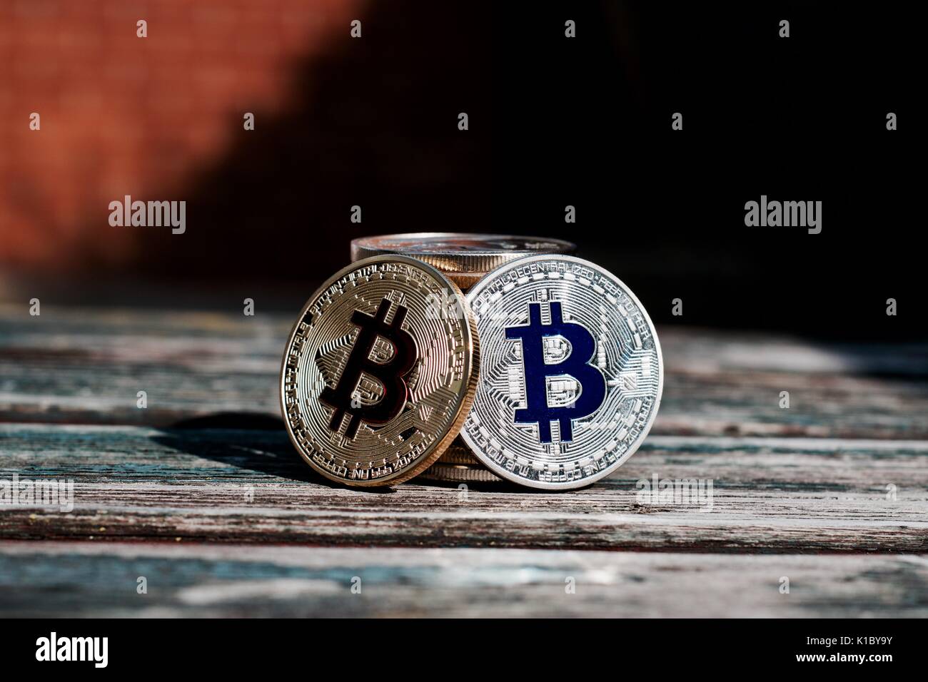 Digital currency physical gold red bitcoin coin. Outdoor money concept ...