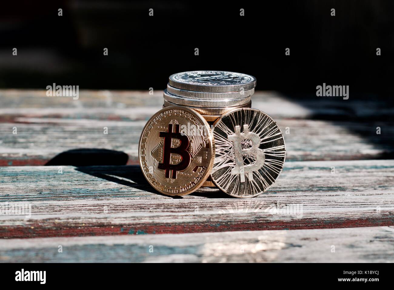 Digital currency physical gold red bitcoin coin. Outdoor money concept ...