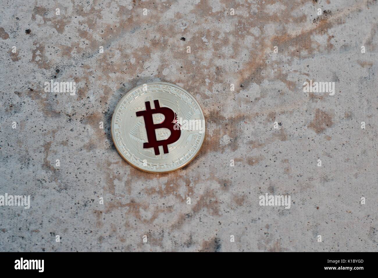Digital currency physical gold red bitcoin coin. Outdoor money concept ...