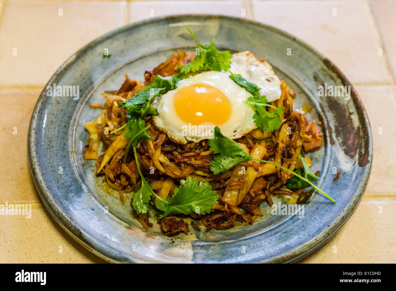 Bokkeumbap, South African cabbage based spicy dish served with fried ...