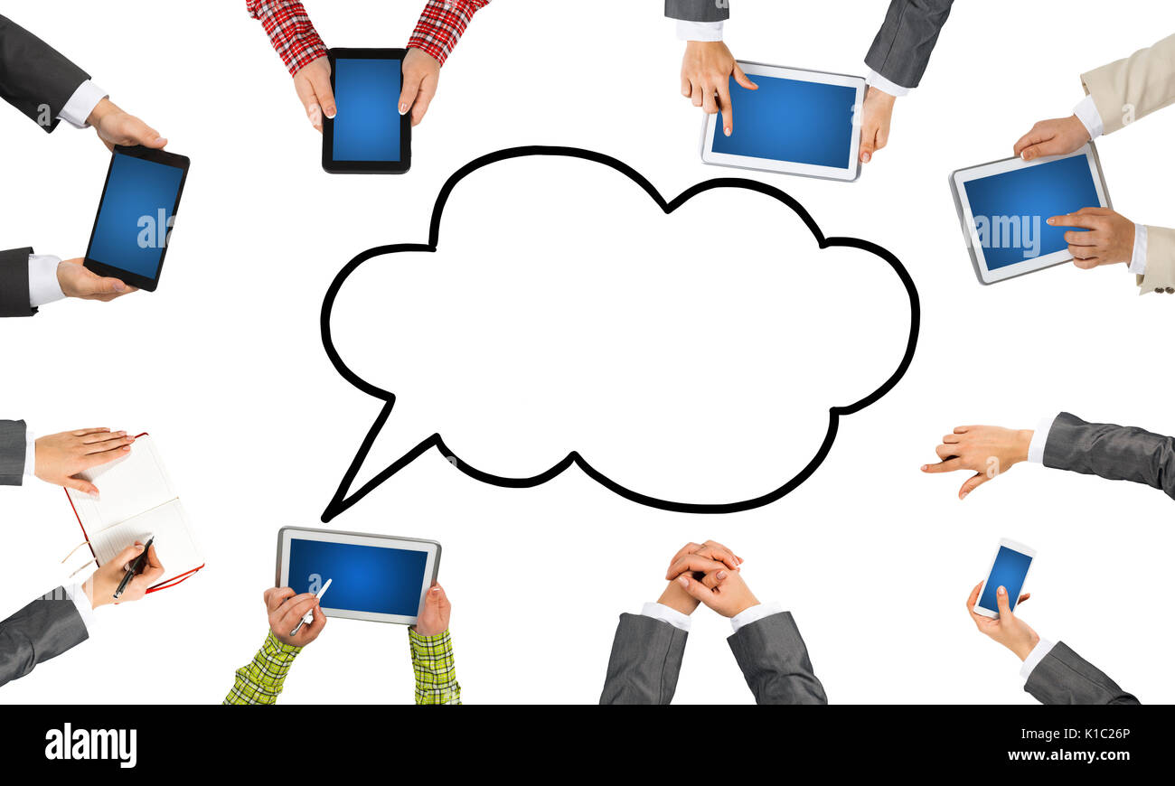 Group of people with devices in hands working together as symbol of ...